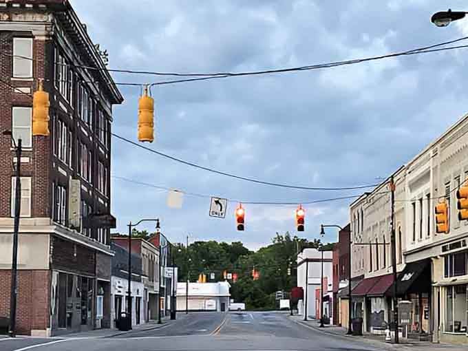 Main Street America lives here, where traffic lights swing gently and every storefront tells a story.