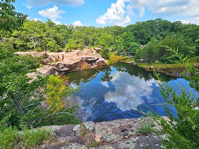 Ancient pink granite boulders create a natural playground that makes you feel wonderfully small against geological time.