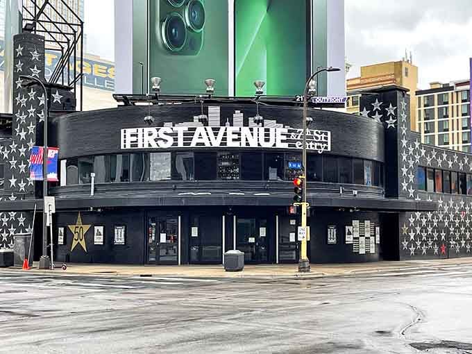 The iconic black facade covered in white stars marks where music legends played and maybe never left.