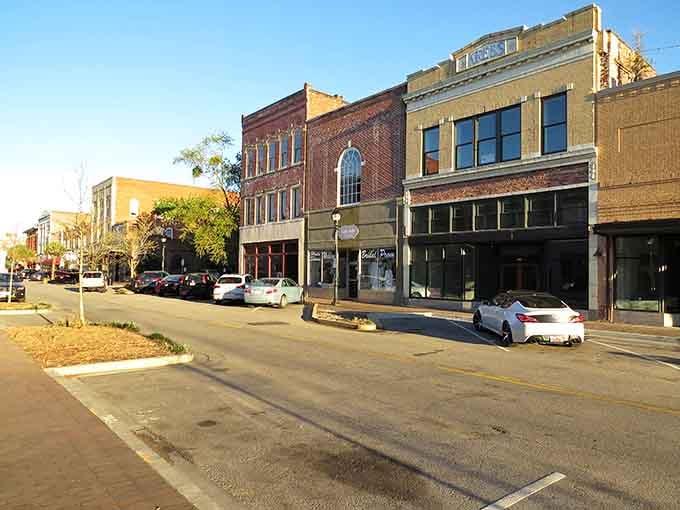 These colorful facades pop like a box of crayons, proving downtown revival doesn't require cookie-cutter corporate chains.