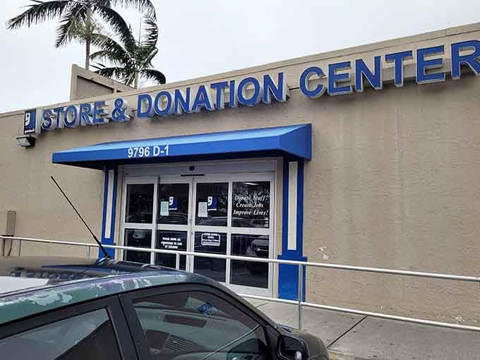 The blue awning beckons like a beacon of hope for bargain hunters seeking quality donations and great finds.