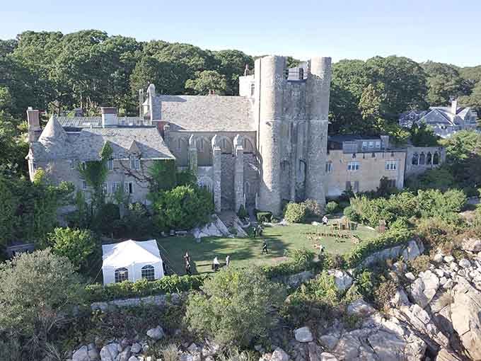 A medieval castle perched on coastal rocks looks like something straight from a King Arthur tale.
