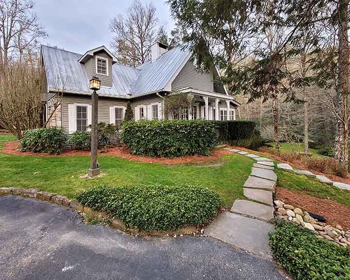Metal roofing and mountain charm blend together like a cozy Swiss cottage nestled in the Carolina hills.