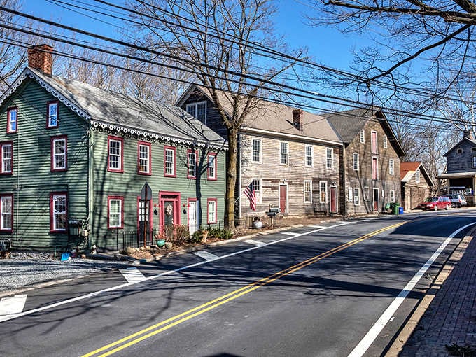 Historic homes painted in muted greens and grays stand shoulder-to-shoulder, their colonial bones showing proud American heritage.