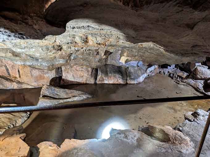 Underground pools reflect ancient rock formations in this cavern where nature's been sculpting masterpieces for millions of years.