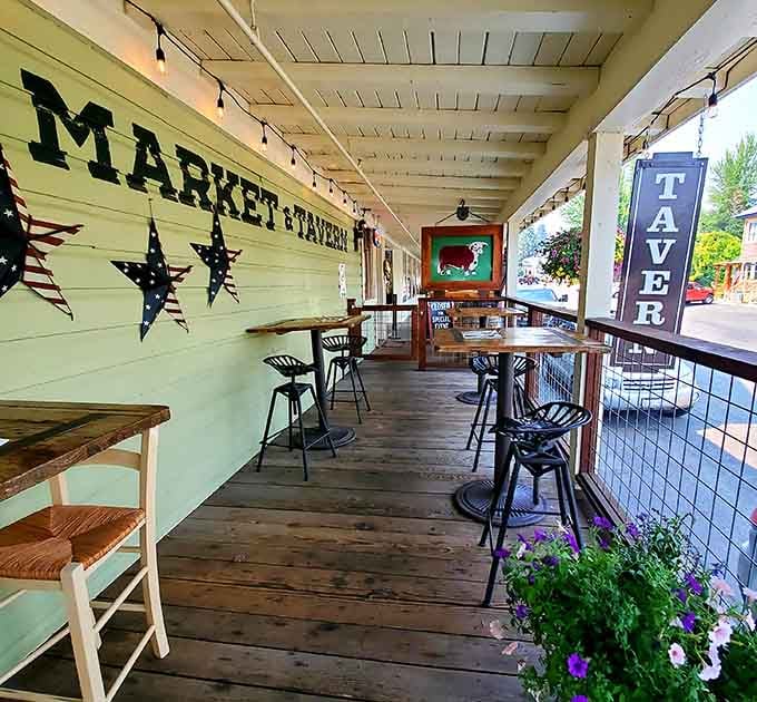 The porch seating with patriotic stars tells you this place celebrates American beef done right.