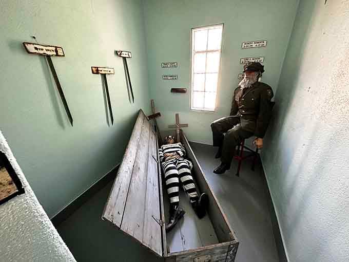 This chilling display recreates the stark reality of prison life with unsettling authenticity and period detail.