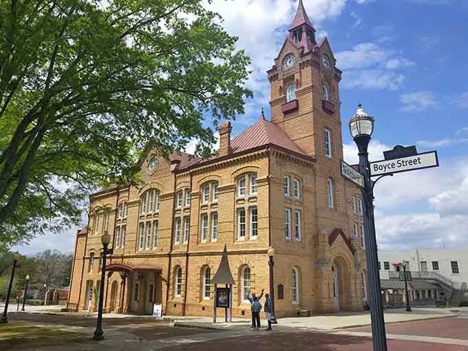 This stunning courthouse with its red-tiled roof looks like it belongs in a history book's best chapter.