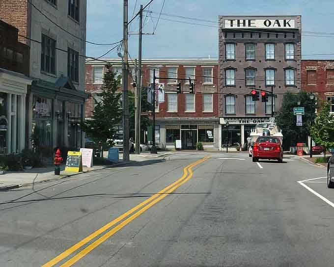 The Oak building stands proud like a grandfather who refuses to retire despite everyone's suggestions otherwise.