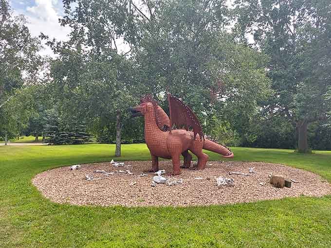 Rusty's textured metal scales catch autumn light beautifully, proving dragons belong in peaceful parks too.