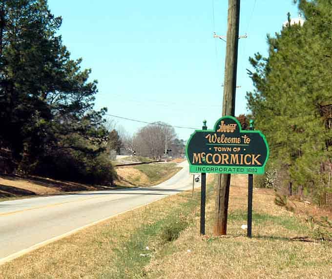 McCormick's welcoming sign stands proud since 1894, greeting travelers like an old friend who never forgets your name.