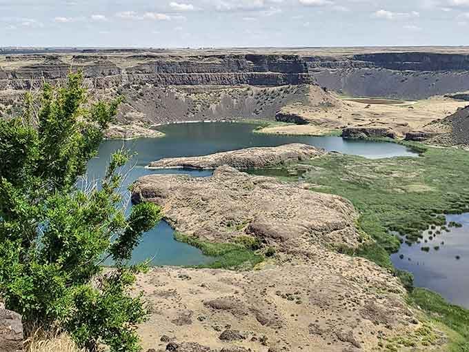 Emerald lakes nestle in the old waterfall basin where millions of gallons once thundered down daily.