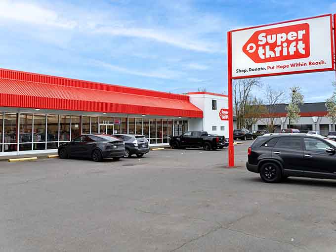 That bright red awning stretches across the storefront like a welcome mat for anyone seeking quality goods at sensible prices.
