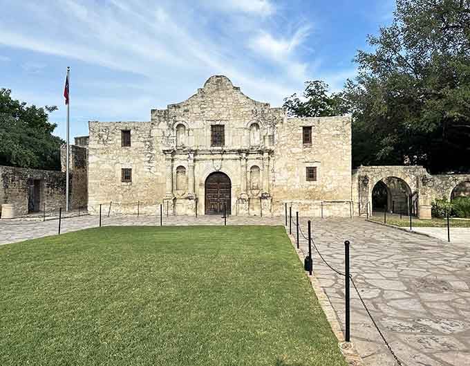 Stand before this limestone fortress and feel centuries of courage echoing through those iconic walls.