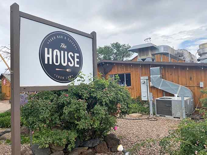 The simple sign and rustic wooden exterior hide a surprisingly creative dining experience waiting inside for you.