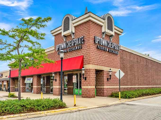 Red awnings frame this brick building beautifully, promising stylish finds inside for the fashion-forward thrifter.
