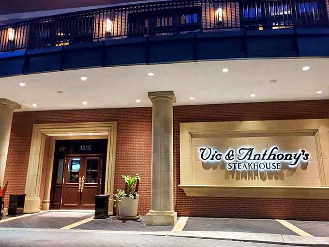 Classic brick and elegant columns frame the entrance like a portal to serious steak heaven and impeccable service.