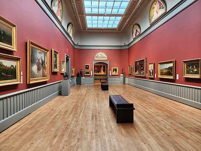 These coral-pink gallery walls showcase masterpieces in a setting that feels both grand and surprisingly intimate at once.