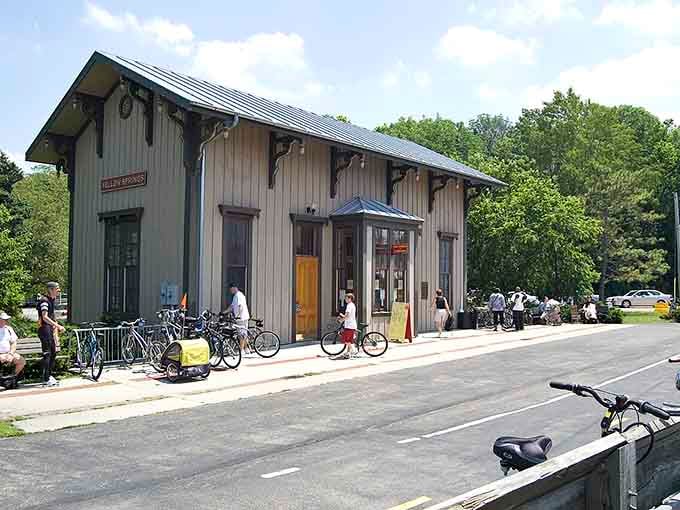 Bicycles line up outside this charming depot where small-town character meets two-wheeled adventure and community spirit.