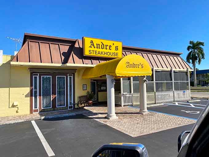 The sunny entrance and white picket fence give this Naples spot a welcoming charm that matches the food.