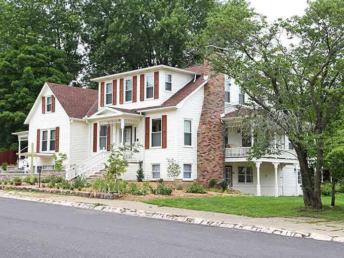 Classic white clapboard homes nestle into hillsides like they've been there since Eisenhower was president, maybe longer.