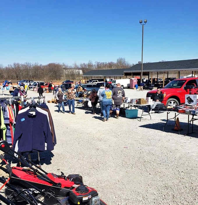 Fresh air and open skies make treasure hunting feel like a community celebration under this welcoming blue canopy.