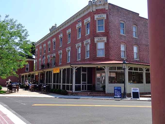 Outdoor dining along this tree-shaded street where the biggest decision is which restaurant to try first.