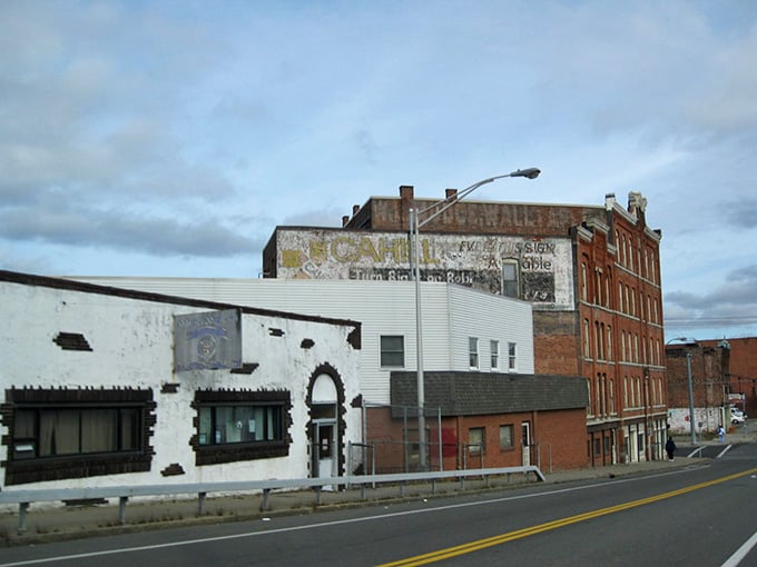 Faded ghost signs on brick walls whisper Binghamton's industrial past, adding character you can't buy at any price today.