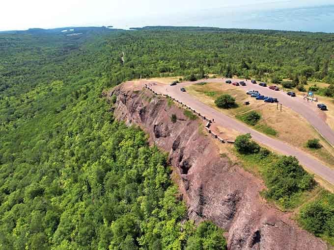 The dramatic cliff edge and sweeping lake vista create a panorama that'll make your heart skip a beat.