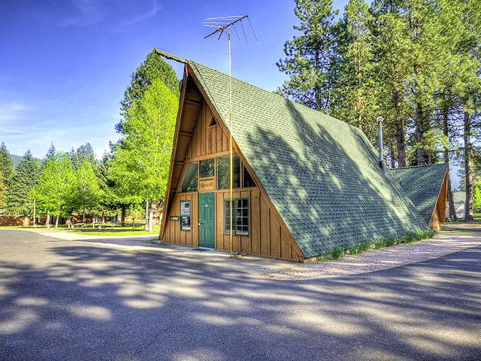 This classic A-frame cabin stands ready to shelter adventurers seeking refuge in the forest's quiet embrace.