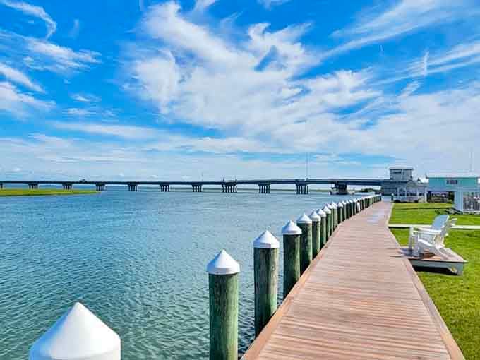 The pier extends into calm bay waters under cotton-candy skies, promising tranquility at every step forward.
