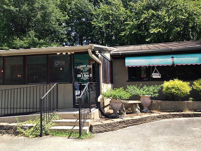 That turquoise awning and welcoming entrance lead to plates of Southern comfort that'll make you loosen your belt happily.