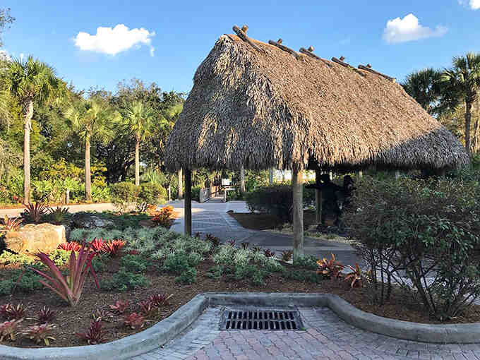 This thatched-roof chickee hut offers shade and Southern hospitality, perfect for lazy afternoon conversations with new friends.