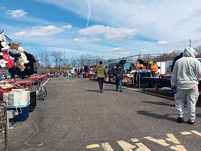 Rows of outdoor vendors stretch into the distance, each table promising something unexpected you didn't know you needed.