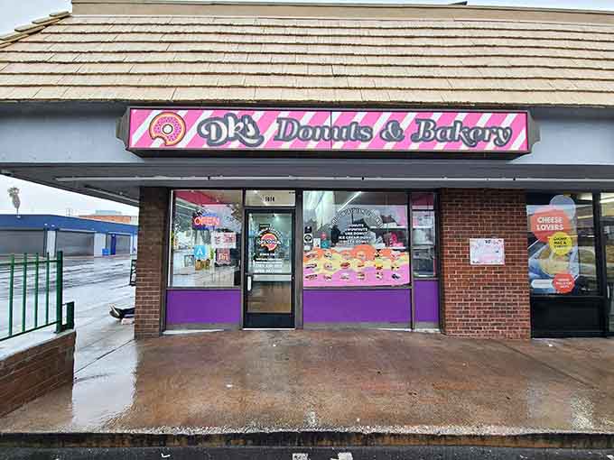 The cheerful donut displays in the windows promise buttery croissants and classic glazed treats made with genuine care.