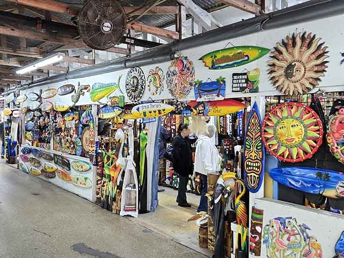 Vibrant wall art featuring tropical fish and smiling suns brings vacation vibes to your shopping experience every single visit.