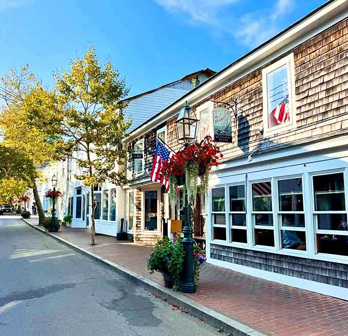 Morning light catches the shingled buildings and patriotic touches that make every day feel like a small celebration here.