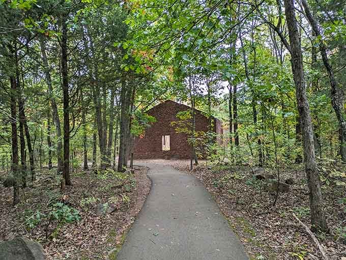 The tree-shaded path winding through these massive stones invites leisurely exploration at whatever pace suits your knees.