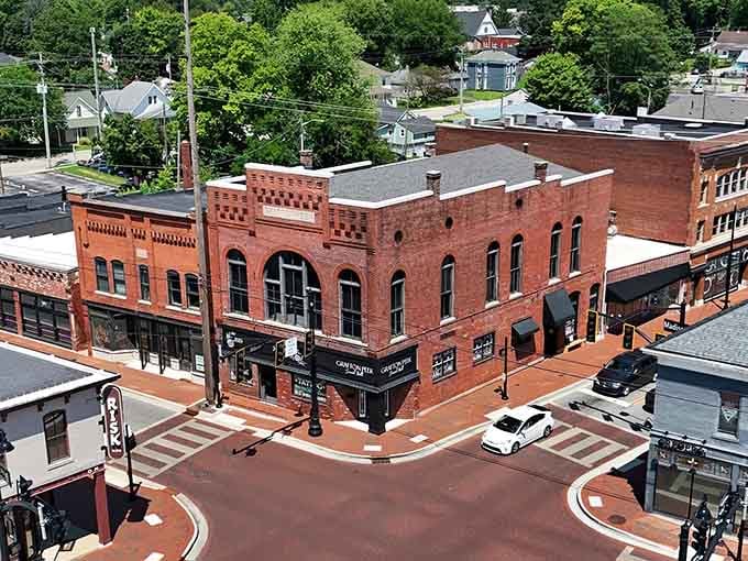 Brick buildings rise above tree-lined streets, blending history with the energy of today's downtown revival.