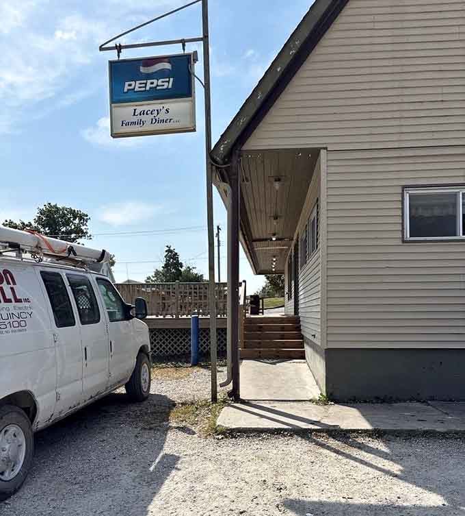 The covered porch and simple entrance prove the best meals don't need fancy facades, just honest cooking and warm welcomes.