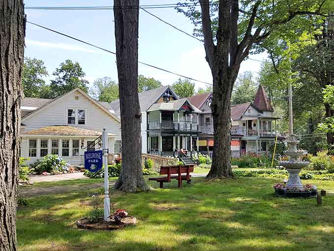 A tranquil park setting where the biggest decision is which porch rocker to claim for the afternoon.