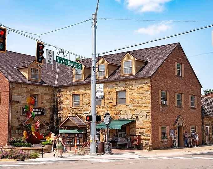 That golden limestone building glows in the afternoon sun like butter melting on warm cornbread, absolutely gorgeous.
