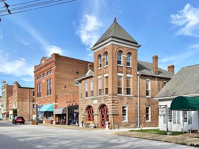 That distinctive tower rises above the streetscape like a beacon from another era entirely.