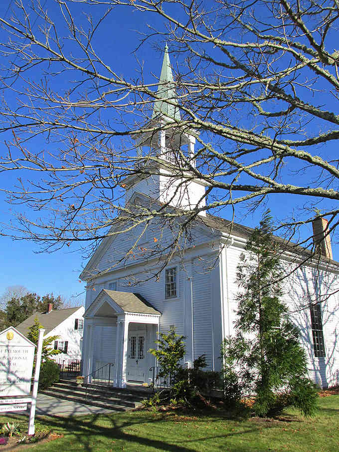 That pristine white steeple reaches skyward like it's been doing for generations of Sunday morning gatherings.