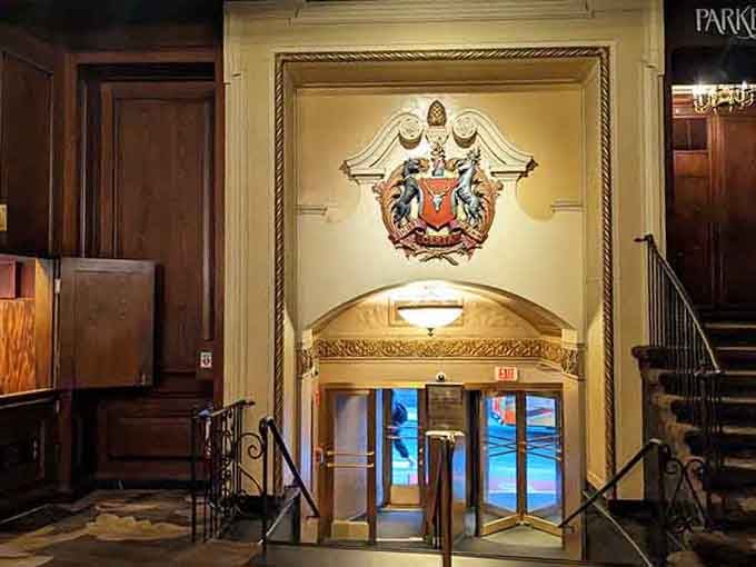 The grand entrance crest and polished details remind you why this historic hotel has hosted presidents and literary legends.