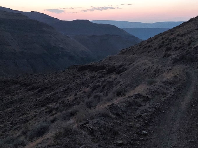 Sunset paints the canyon walls in shades that would make even Bob Ross reach for extra brushes.