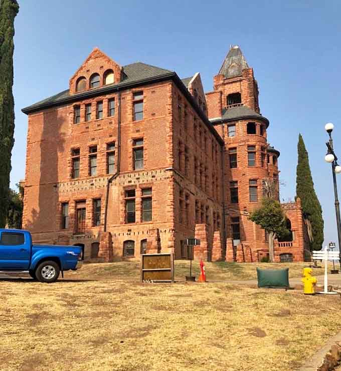 Those arched windows and imposing tower make this reform school look more like a Victorian mansion than a correctional facility.