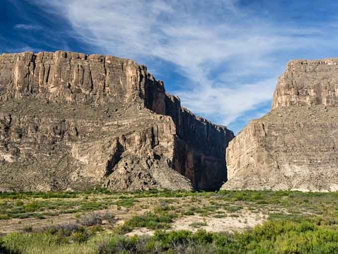Those limestone cliffs rise like ancient fortress walls guarding secrets older than any human story we know.