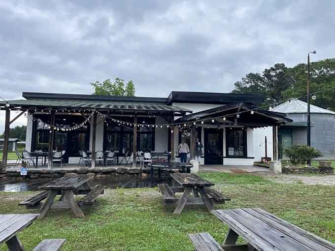 Those picnic tables out front hint at the laid-back atmosphere where exceptional steaks meet genuine Southern hospitality.