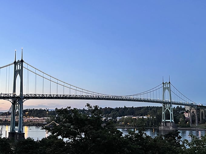 At twilight, those twin spires frame the river view like a postcard you'd send from somewhere far more exotic.